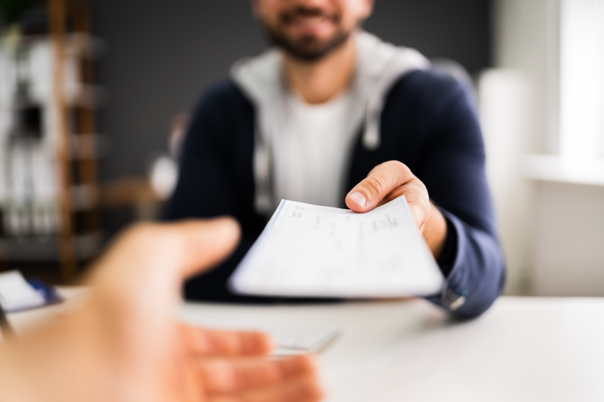 How does National Insurance work for employers and the self-employed?